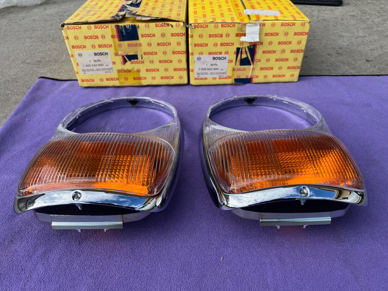NOS BOSCH W113 North American Headlight Doors For Sale | The MB Market
