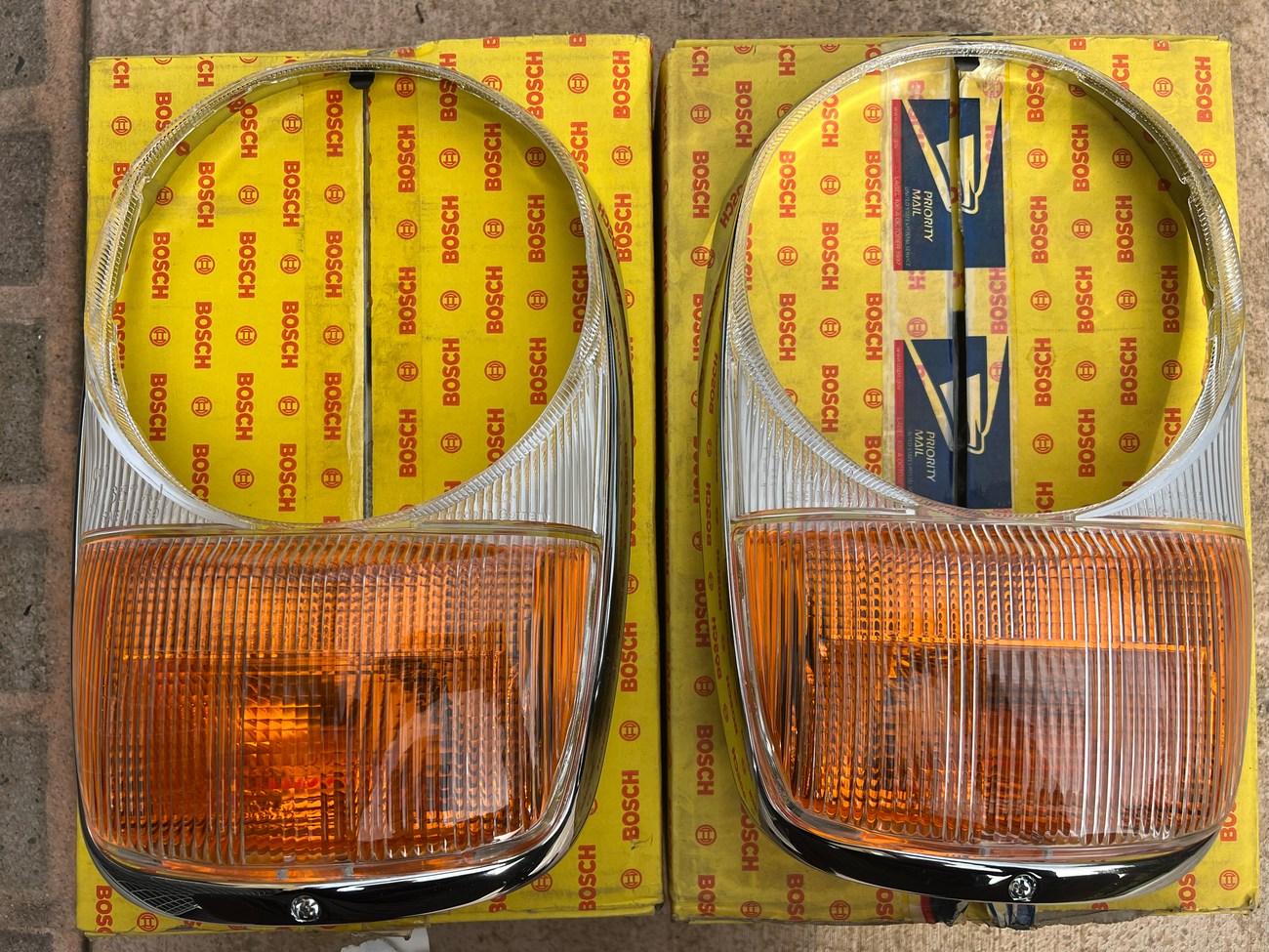 NOS BOSCH W113 North American Headlight Doors For Sale | The MB Market