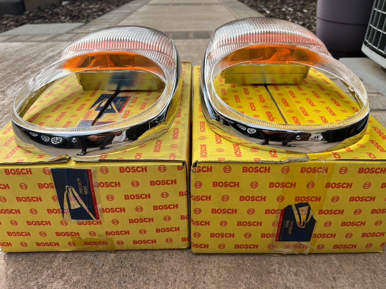 NOS BOSCH W113 North American Headlight Doors For Sale | The MB Market