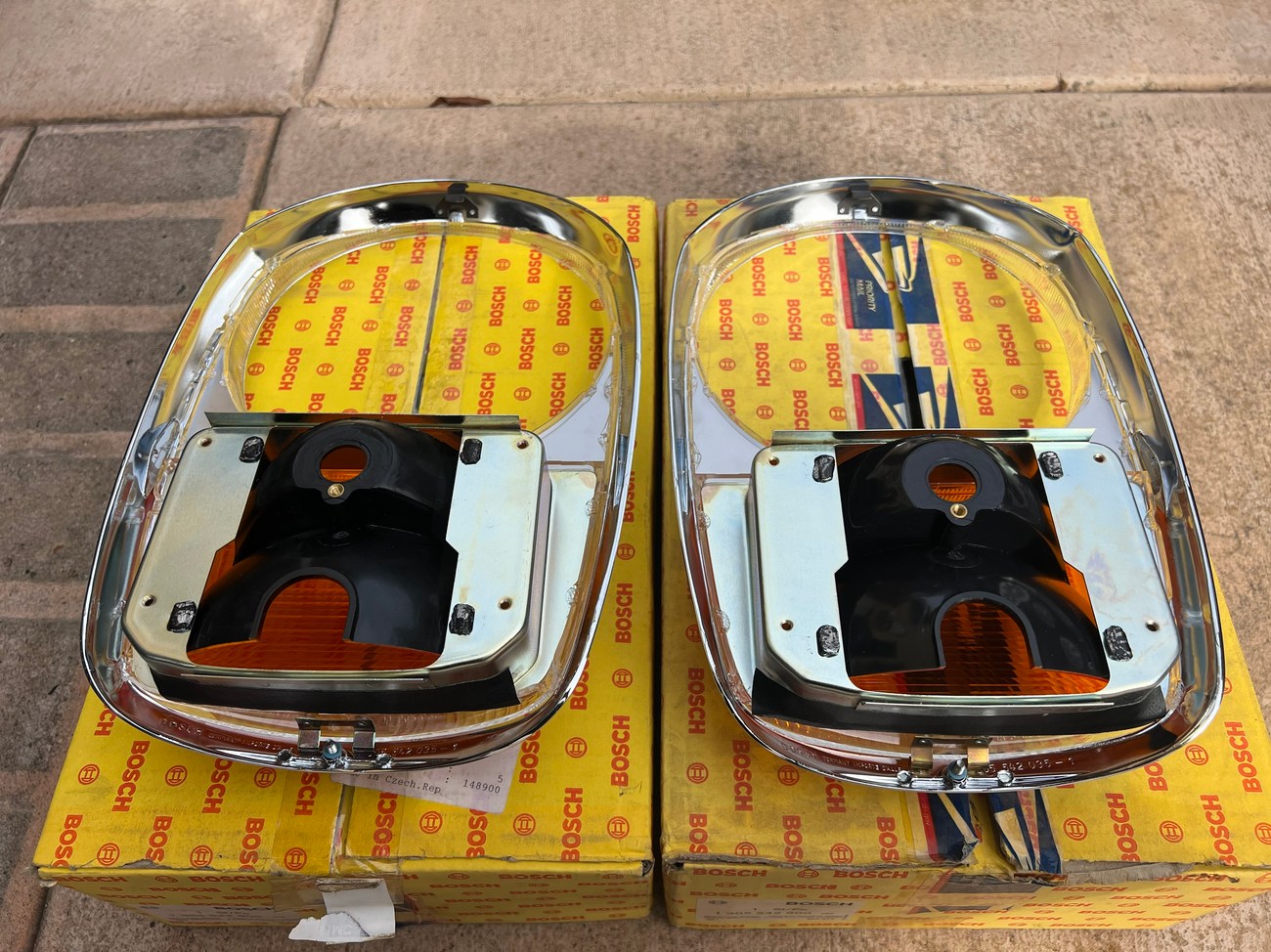 NOS BOSCH W113 North American Headlight Doors For Sale | The MB Market