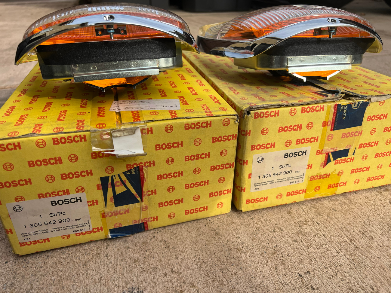 NOS BOSCH W113 North American Headlight Doors For Sale | The MB Market